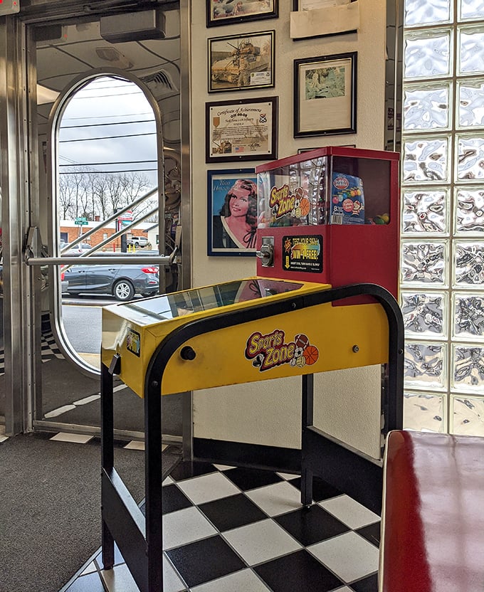 A pinball machine by the entrance—because sometimes you need to work up an appetite or walk off that slice of pie.