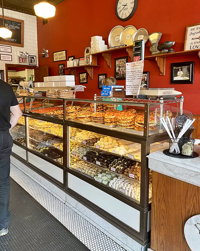 The display case that launched a thousand cravings. Rows of Italian cookies and pastries await their fate – becoming someone's best decision of the day.
