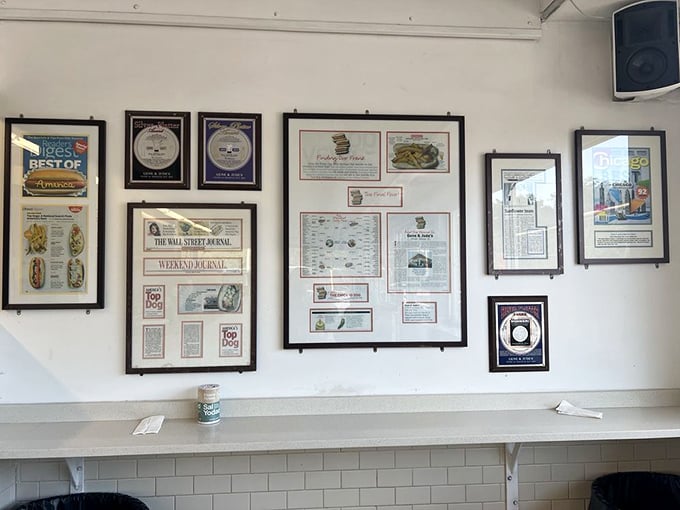 Each framed article and award is a chapter in the Gene & Jude's legend—a scrapbook of Chicago food history on display.