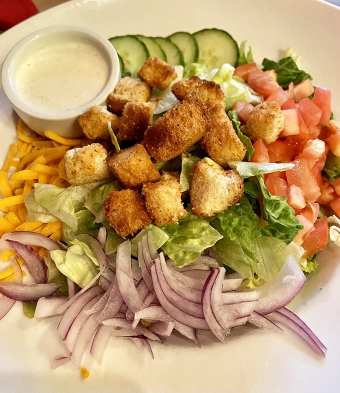 A salad that actually deserves the name—crisp, colorful, and crowned with croutons that crunch like nature's exclamation points.