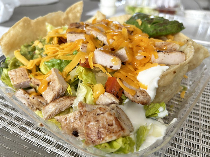 A salad that doesn't apologize for being healthy. Fresh ingredients arranged with such care you'll forget you're eating something good for you.