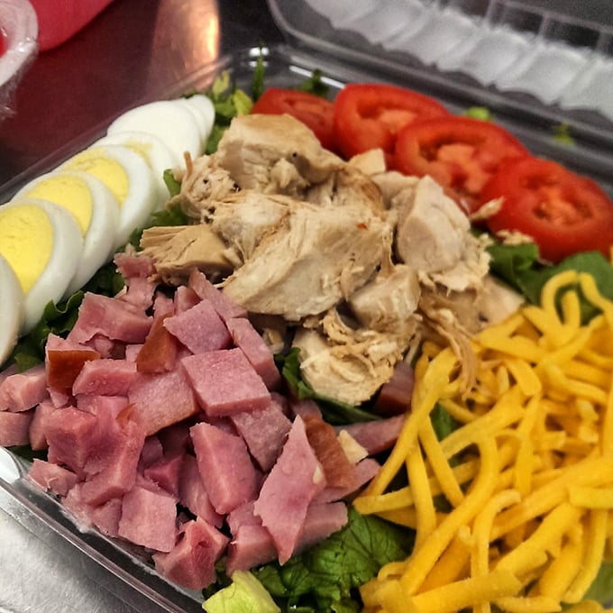 Not all heroes wear capes – some come in plastic containers. This chef's salad proves Drake's can do fresh and colorful just as well as fried and fabulous.