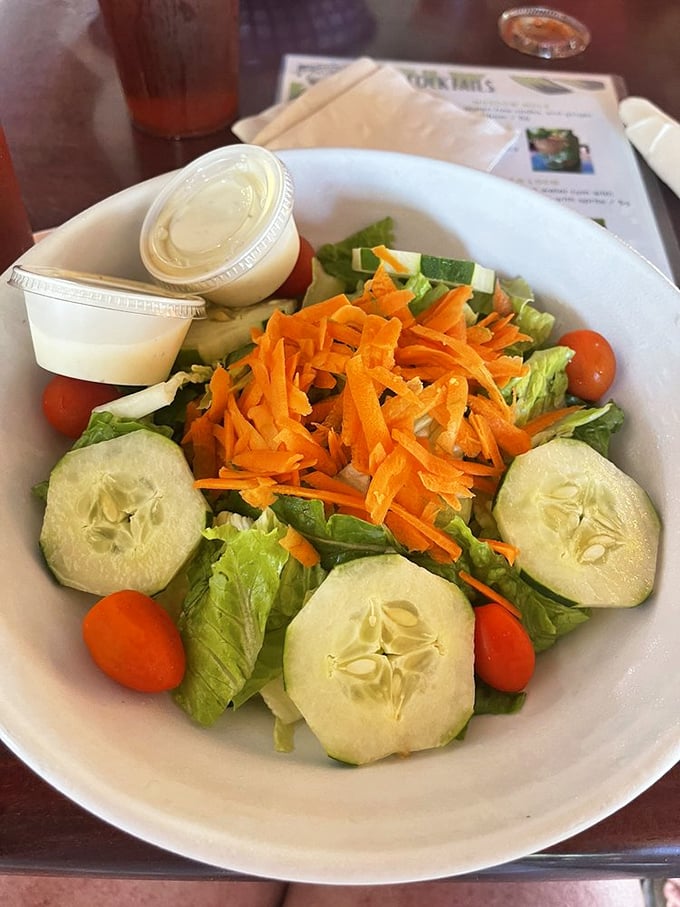 A salad that doesn't apologize for being a salad—bright, crisp, and ready to balance out whatever fried goodness you've been enjoying. Virtue in a bowl.
