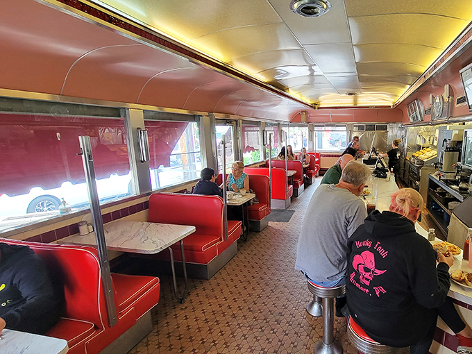 Red booths filled with locals sharing stories and laughter – this is where community happens, one meal at a time.