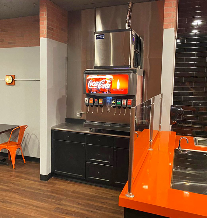 The self-serve soda station stands ready for duty. That Coca-Cola sign has been guiding thirsty travelers since we were kids.