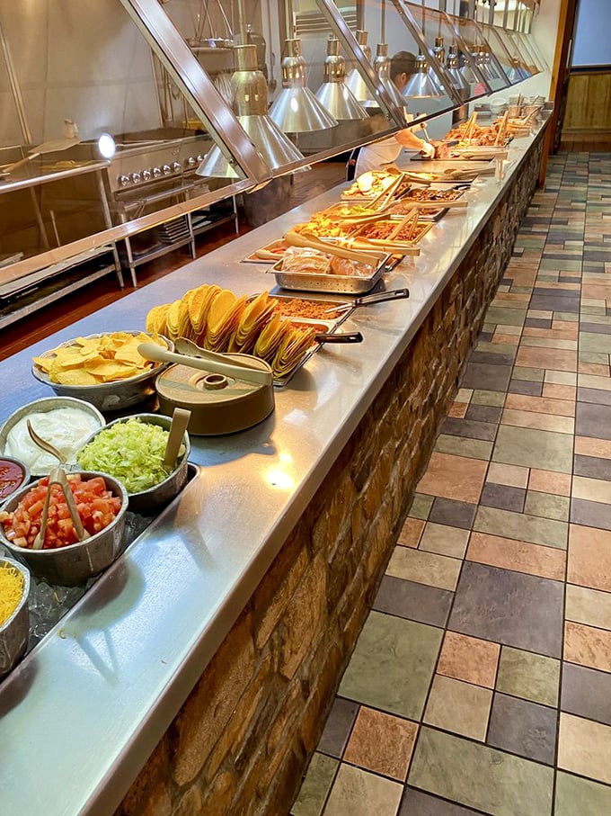 The taco bar setup—where you can construct architectural masterpieces that would make Frank Lloyd Wright proud, if Frank Lloyd Wright used guacamole as mortar.