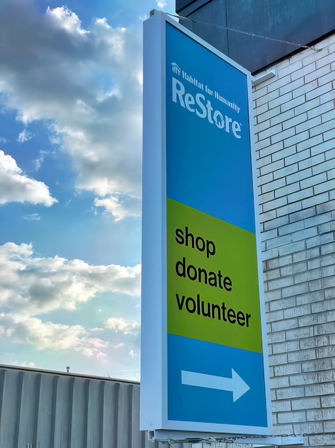 The sign says it all—shop, donate, volunteer. It's the virtuous circle of home goods, pointing the way to bargain bliss.