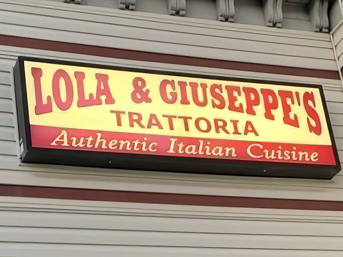 The sign glows like a beacon for hungry travelers, promising authentic Italian cuisine that delivers on every syllable.