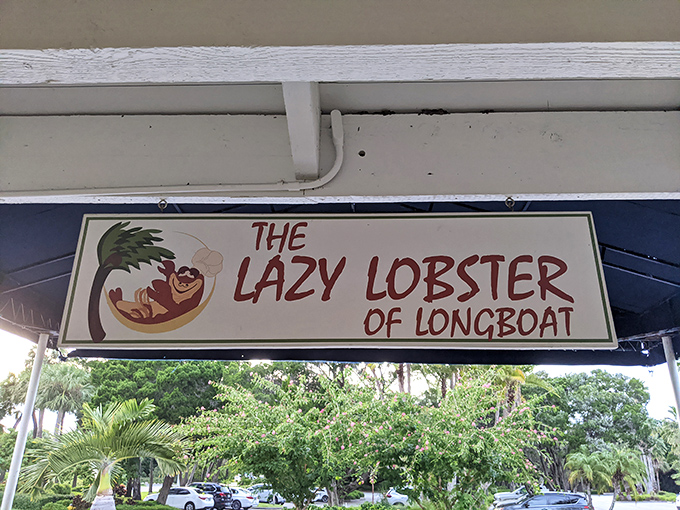 The sign says it all—a cartoon crustacean lounging in a hammock, living its best life just like you're about to.