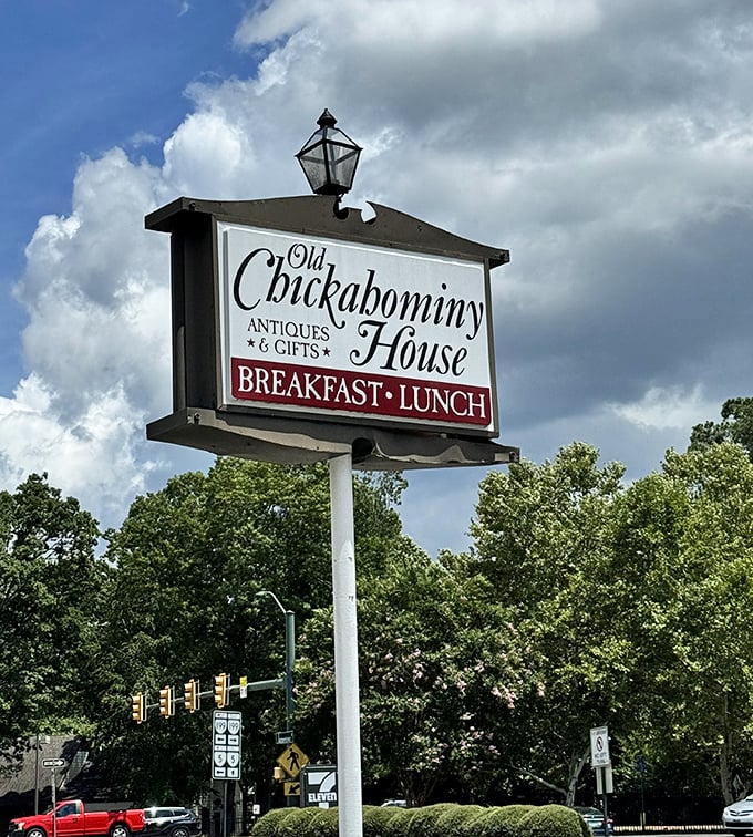 The sign promises three things—breakfast, lunch, and antiques—and delivers four: an experience you'll be talking about for years.