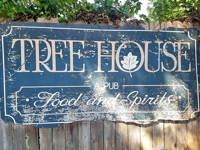 A sign weathered just enough to suggest authenticity without trying too hard. "Food and Spirits" promises exactly what your soul needs.
