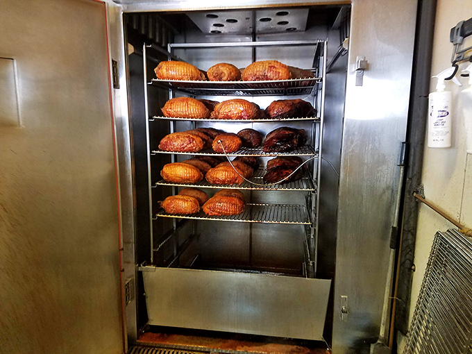 The smoking chamber, where chicken transforms from ordinary to extraordinary. Like a spa retreat, but for poultry—and with tastier results.
