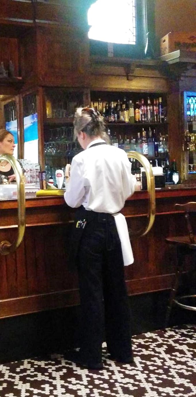 White shirts, black pants, and decades of service expertise. At Bender's, the staff doesn't just serve food—they're custodians of a culinary tradition.