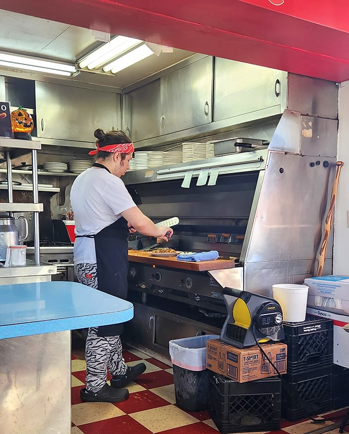 The red bandana isn't just a fashion statement—it's the uniform of breakfast warriors who flip eggs with the precision of Olympic athletes.