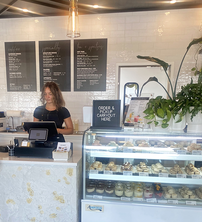The bakery case tempts with treats that make willpower wave the white flag. Resistance is futile, calories be damned.