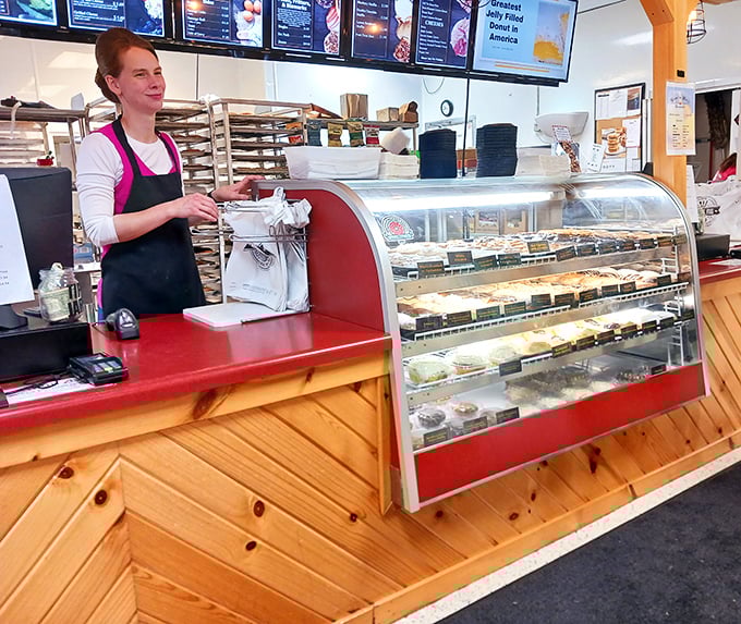 The genuine smile behind the counter isn't part of corporate training—it's the authentic welcome that makes every visitor feel like a regular.