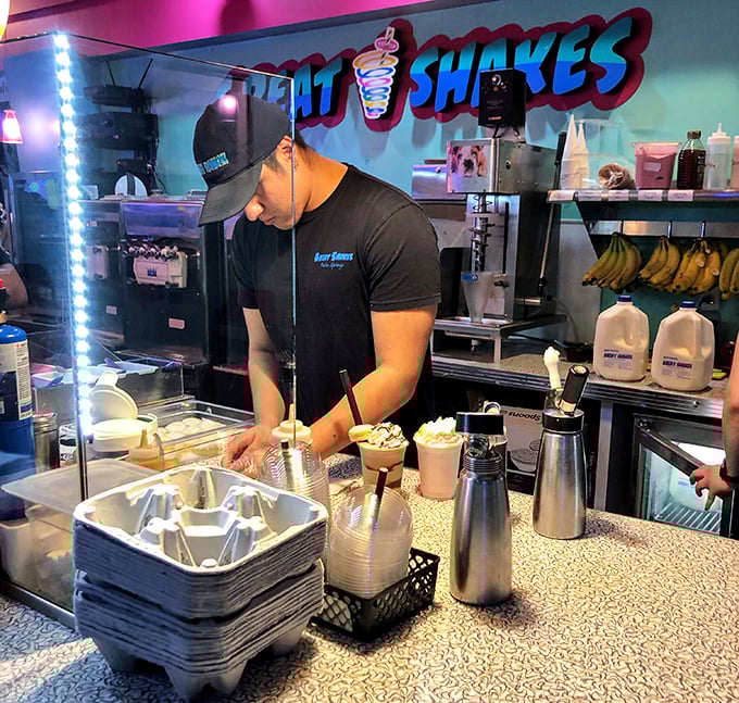 The shake artists at work, wielding blenders like delicious weapons in the war against boring desserts.