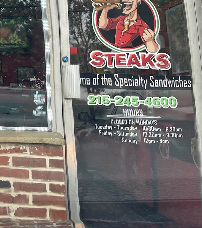 The hours posted like a treasure map—closed Mondays because even sandwich artisans need to rest their creative spirits.