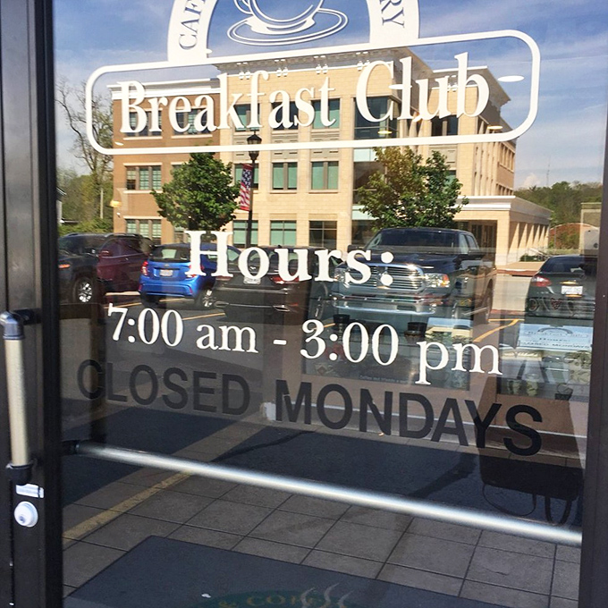 Hours posted like a breakfast manifesto – closed Mondays because even breakfast champions need a day of rest.