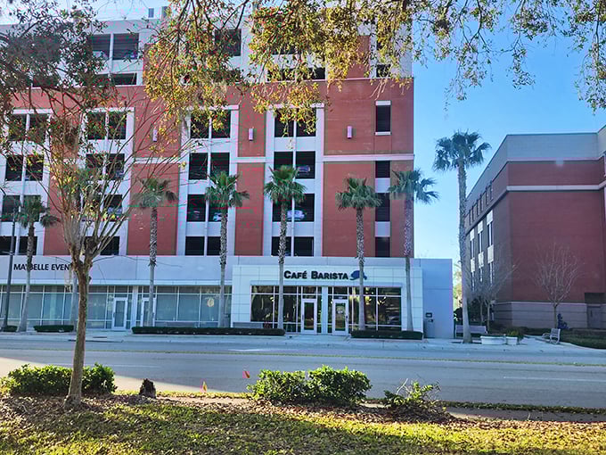 Palm trees stand sentinel outside this modern café, a beacon of breakfast hope in a sea of chain restaurants and tourist traps.