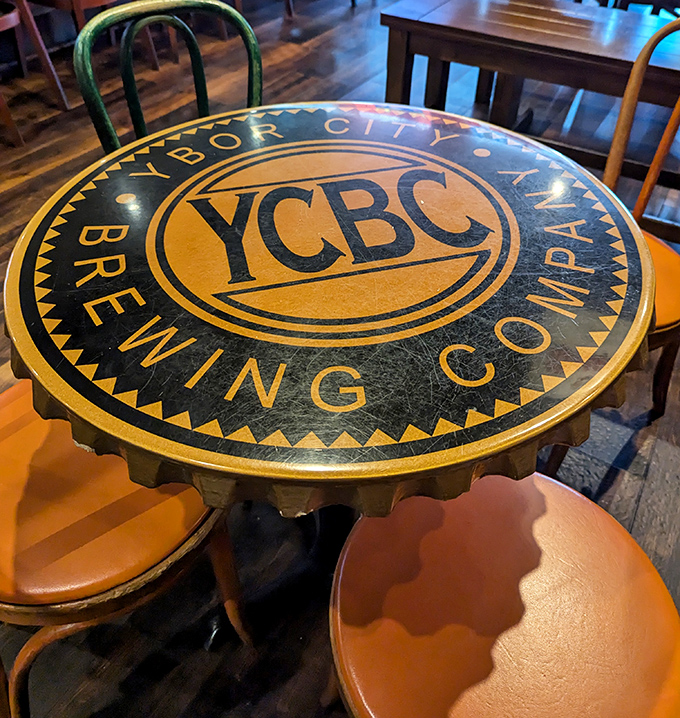 Even the tables celebrate beer culture here. This bottle-cap design isn't just Instagram-worthy—it's a reminder of the craftsmanship in every sip.