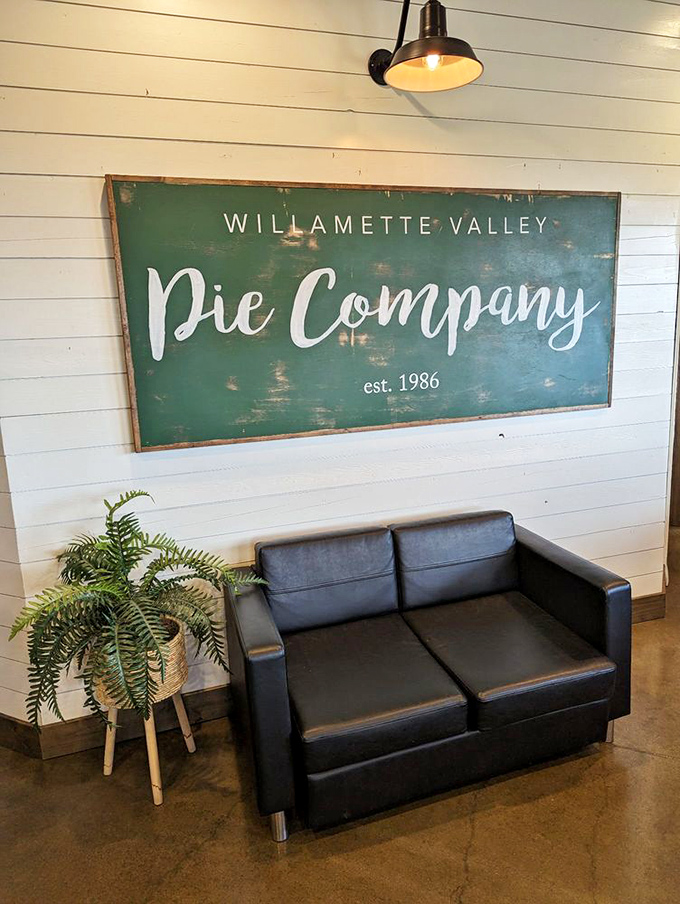 The waiting area features the company's signature sign – where countless visitors have snapped photos while anticipating their berry-filled destiny.