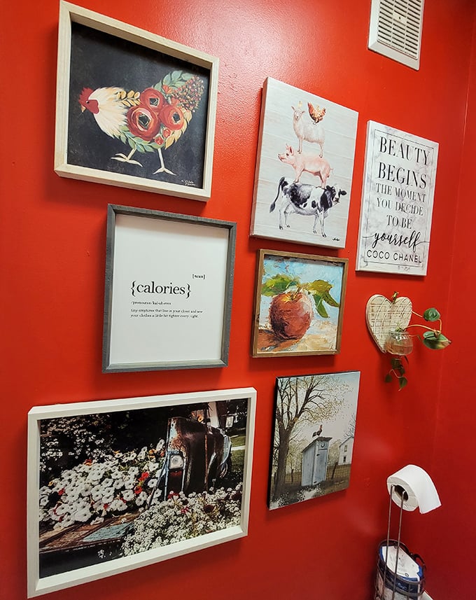 Even the bathroom wall art celebrates food with whimsy—because at The Rooster, the culinary appreciation extends to every corner.