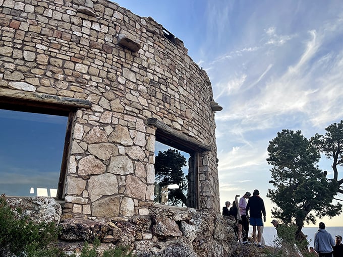 The stonework frames the sky like nature's perfect picture window—no filter can improve on this view.