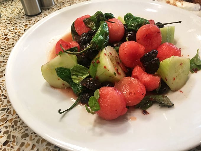 A watermelon salad that's summer on a plate—bright, refreshing, and the perfect counterpoint to all that glorious fried goodness.