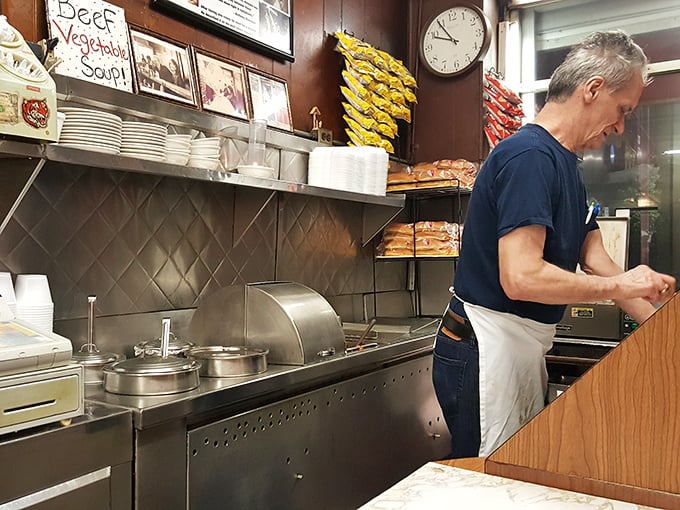 Behind the scenes magic where short-order wizardry happens. Notice the handwritten soup sign—no algorithm recommended that beef vegetable.