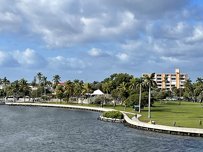 Lake Worth Beach's waterfront park offers palm trees and peaceful views – Florida living at its most relaxed.