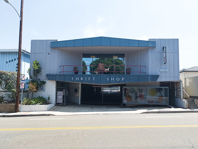 The distinctive retro architecture of this thrift shop hints at its previous life. Those clean white walls now frame doorways to discount treasures!