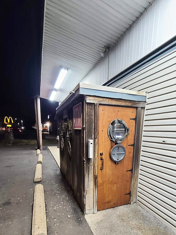 The entrance's wooden door with portholes isn't trying to be cute—it's preparing you for the nautical journey your taste buds are about to take.