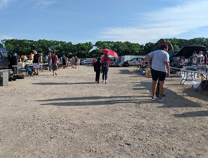 Treasure hunters navigate the weekend flea market – the drive-in's alter ego where one person's castoffs become another's gold.