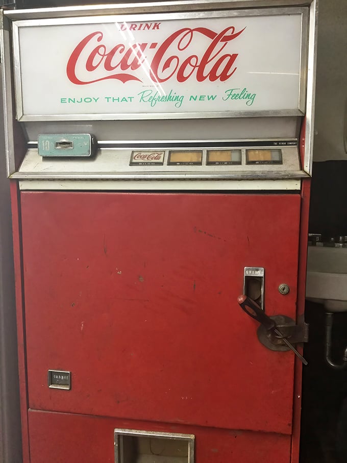 This vintage Coca-Cola machine isn't retro by design—it's the real deal that's quenched thirsts through decades of American history.