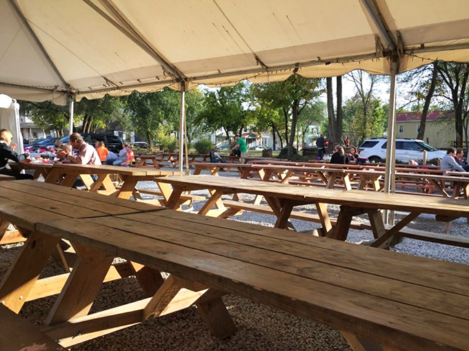 Picnic tables waiting for the barbecue faithful – where strangers become friends over shared sauce and smoked meat philosophies.