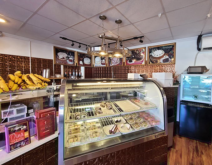 Sweet temptations behind glass—this little bakery counter offers a sugar break for weary shoppers hunting through the market's endless treasures.