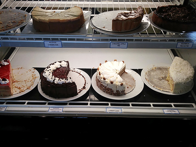 The dessert case—where willpower goes to die and "I'll just have coffee" turns into "and a slice of that chocolate cake, please."