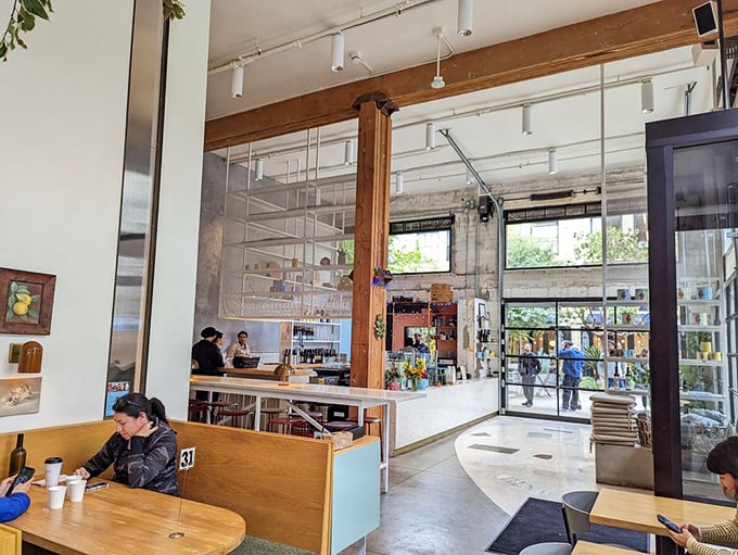 Industrial meets inviting in this carefully crafted interior. Wooden beams and concrete walls create the perfect backdrop for pizza perfection.