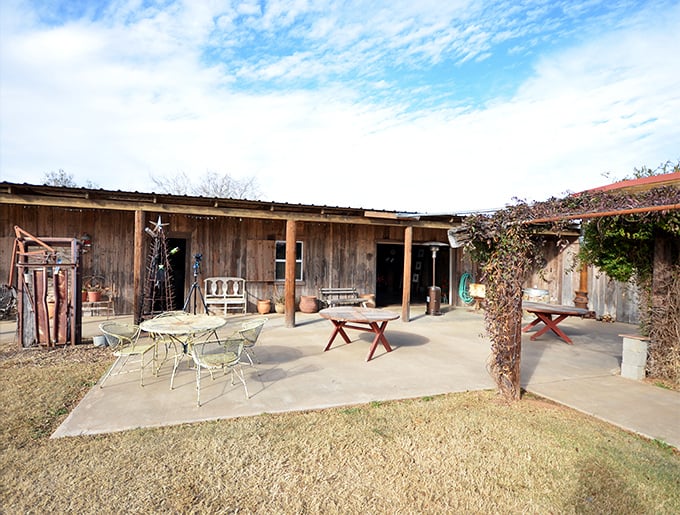 This rustic patio at Barking Rocks Vineyard isn't trying to impress anyone—which is precisely why it's so impressive. Wine country, Texas-style.