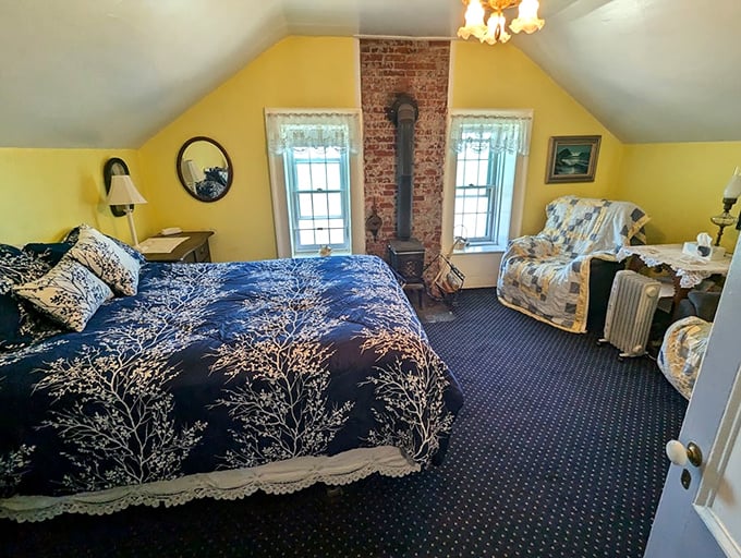 The keeper's bedroom—cozy, practical, and with a view worth more than any five-star hotel. Yellow walls to brighten foggy mornings.