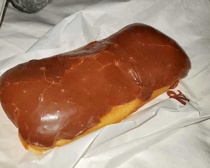 The maple bar—a rectangular canvas of fried perfection that proves not all great art needs to be circular. Picasso would approve.