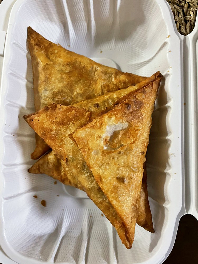 These triangular beef sambusas aren't just appetizers—they're edible treasure chests filled with spiced meat that puts ordinary samosas on notice.