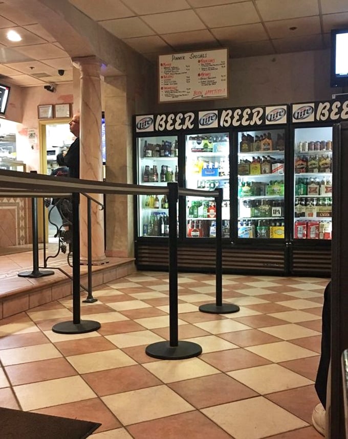 The beverage coolers stand ready—because what's a perfect pizza without the perfect drink pairing to wash it down? 