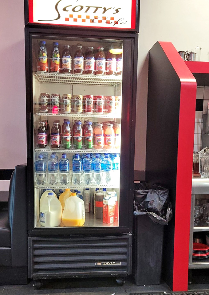 Behind the counter, where the magic happens—staff working in choreographed harmony to keep Columbus well-fed and happy.