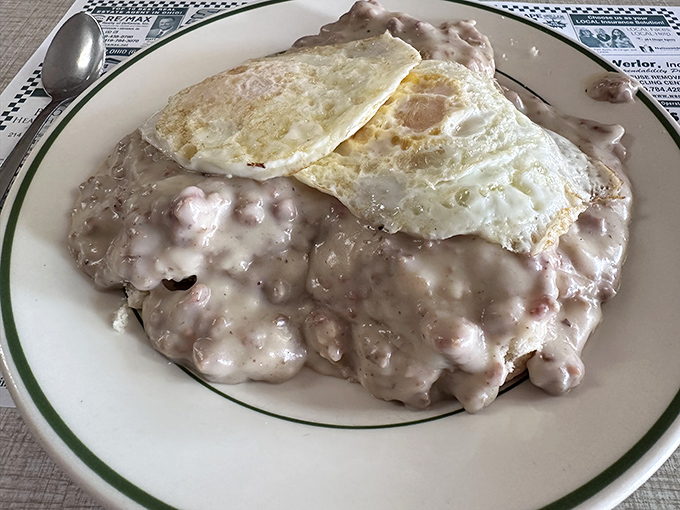 Biscuits and gravy: the breakfast equivalent of a warm hug from your favorite aunt, topped with perfectly fried eggs.