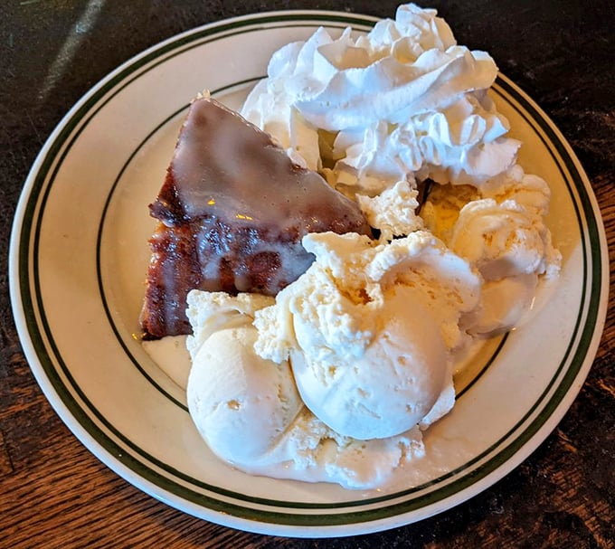 Bread pudding and vanilla ice cream—a dessert marriage made in comfort food heaven. The warm-cold contrast creates a symphony of textures worth saving room for.