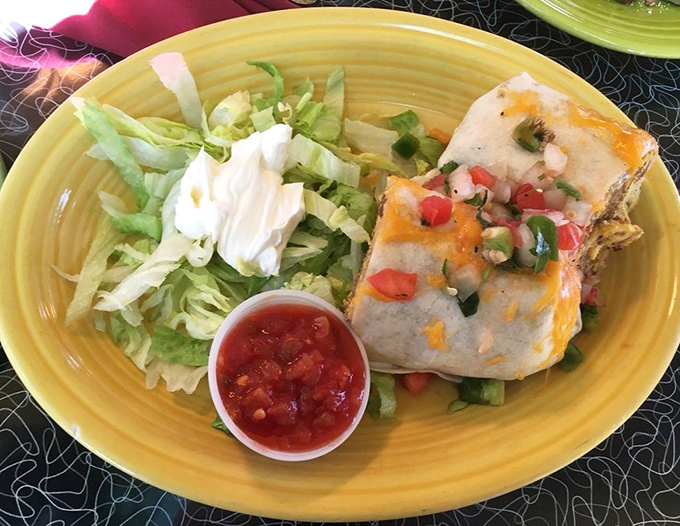 Breakfast burrito that's dressed for success with fresh lettuce, sour cream, and salsa. A handheld fiesta that demands to be devoured.