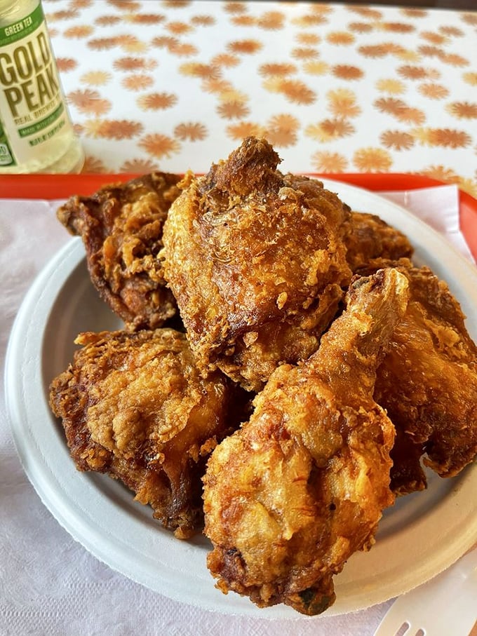 A mountain of broasted chicken that makes you want to cancel your afternoon plans. This isn't just dinner—it's a commitment to deliciousness.