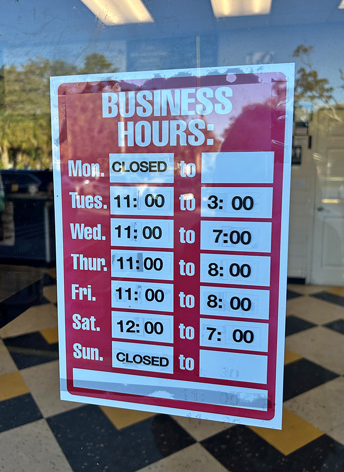The hours posted like a treasure map – plan accordingly, fellow adventurers, for this cheesesteak journey requires proper timing.